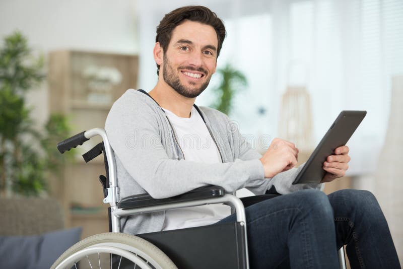 Disabled Man Using Tablet Pc Stock Photo - Image of tablet, traumatic ...