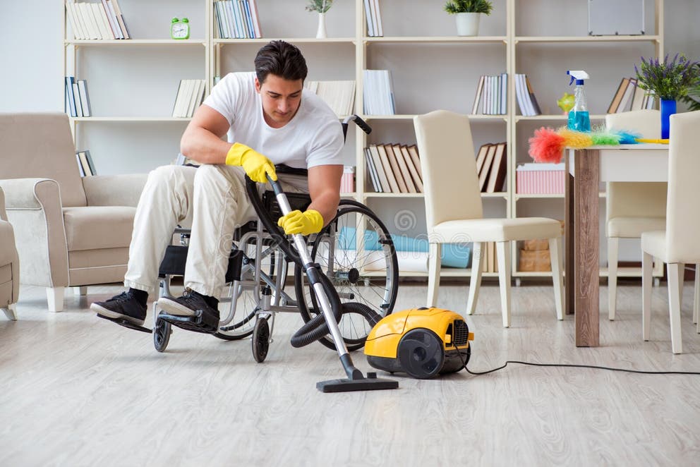 The Disabled Man with Vacuum Cleaner at Home Stock Image - Image of ...