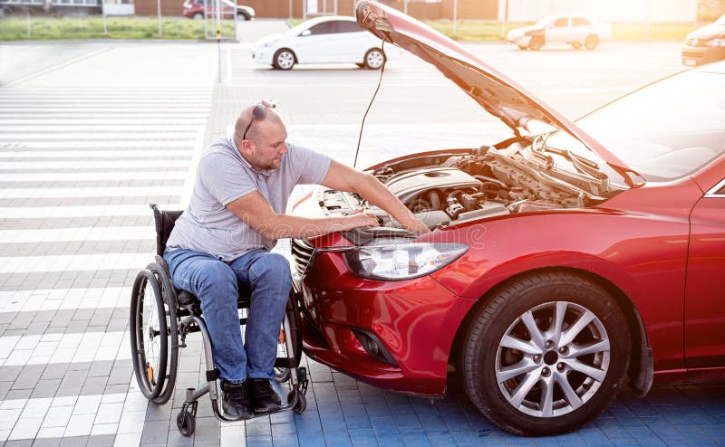 Disabled Man in Wheelchair Check Engine His Car at Parking Stock Image ...