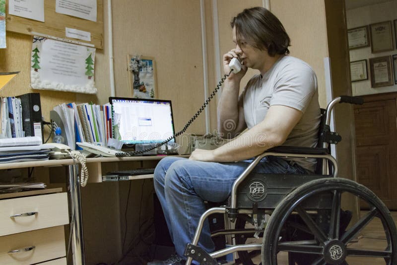 Disabled person at work editorial photography. Image of disability ...