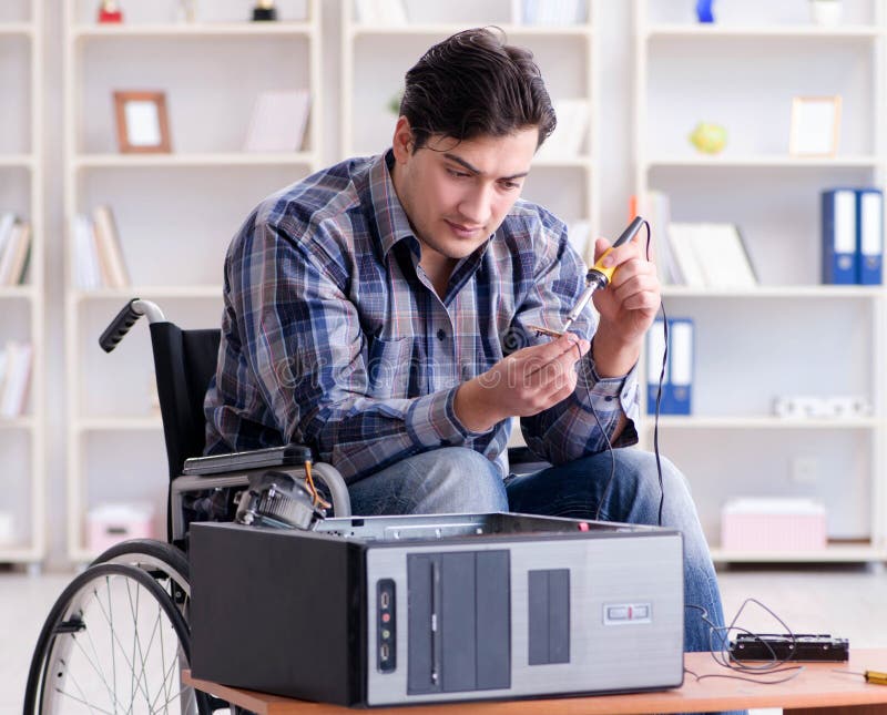 Disabled Man on Wheelchair Repairing Computer Stock Image - Image of ...