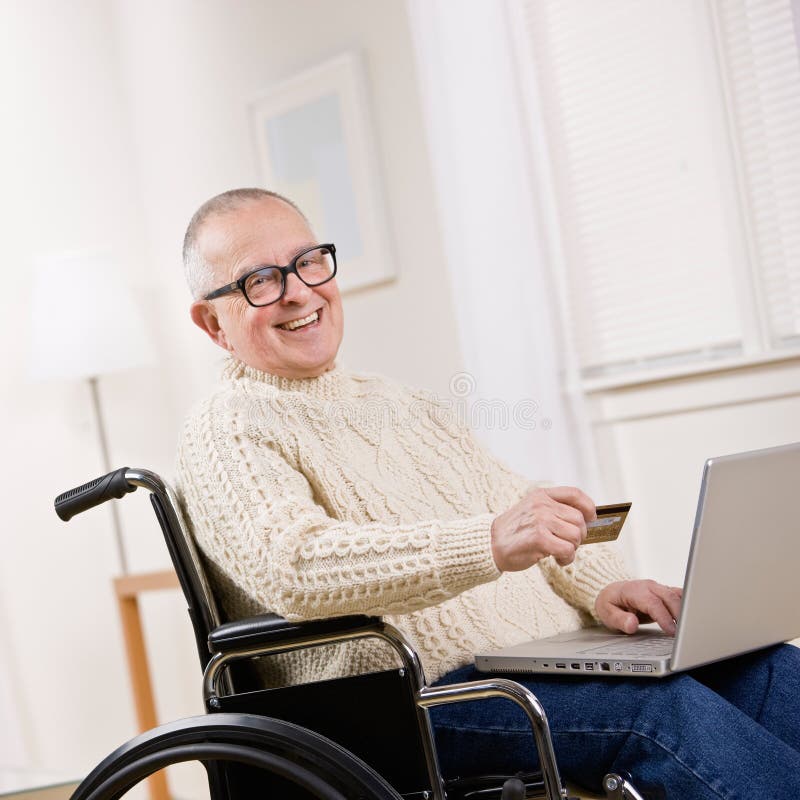 Disabled man in wheelchair stock image. Image of male - 6599381