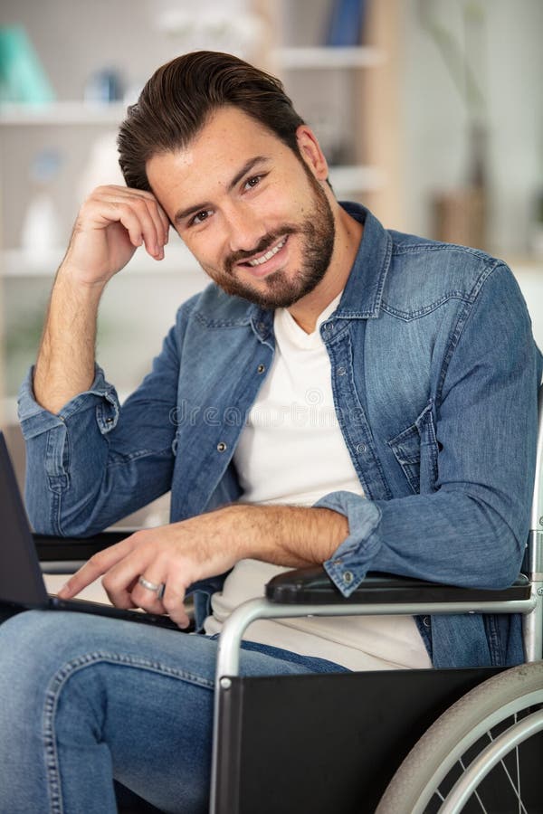 Disabled Man in Wheelchair Using Notebook Computer Stock Image - Image ...