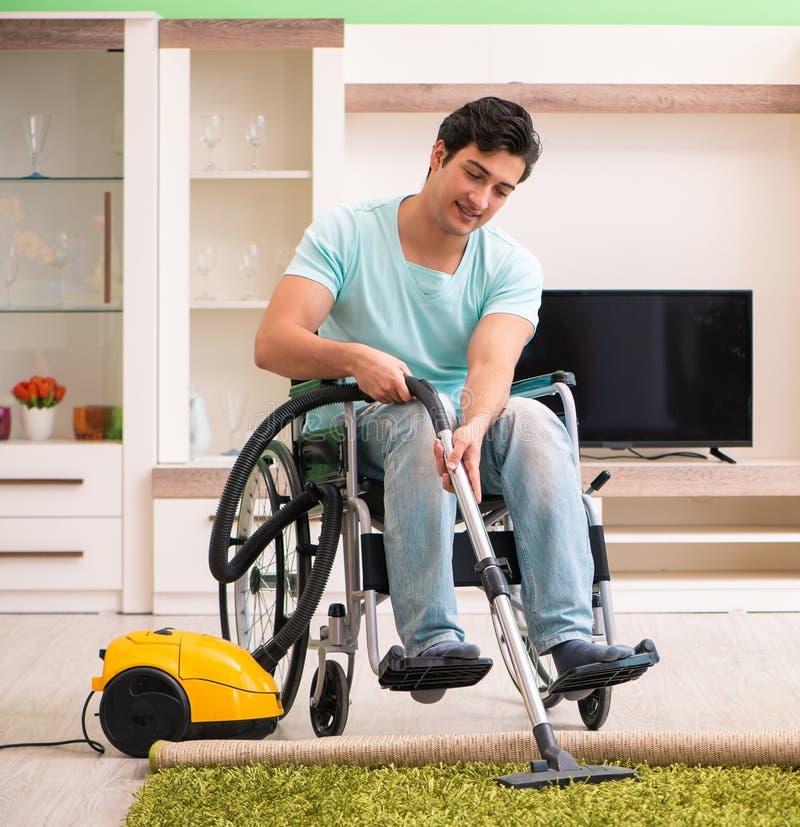 Disabled Man on Wheelchair Vacuum Cleaning House Stock Photo - Image of ...