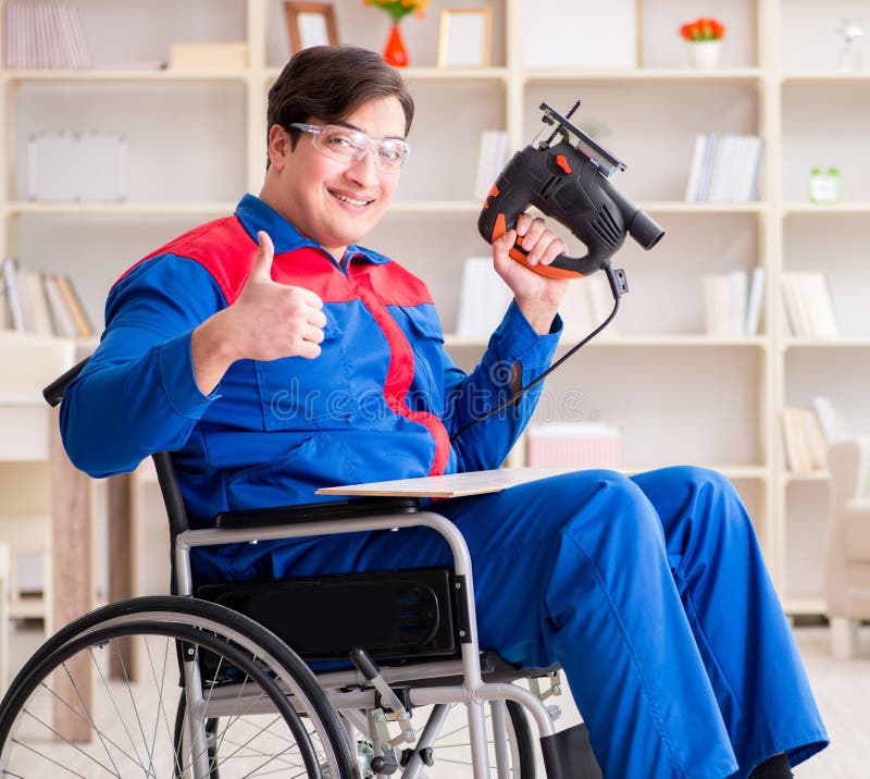 Disabled Man Working with Handsaw at Home Stock Photo - Image of ...
