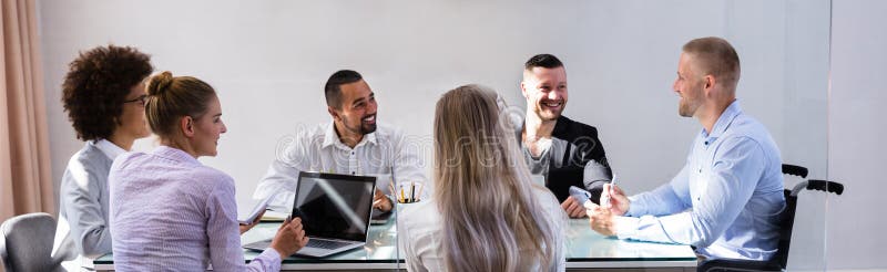 Disabled Manager Sitting with His Colleagues in Office Stock Image ...
