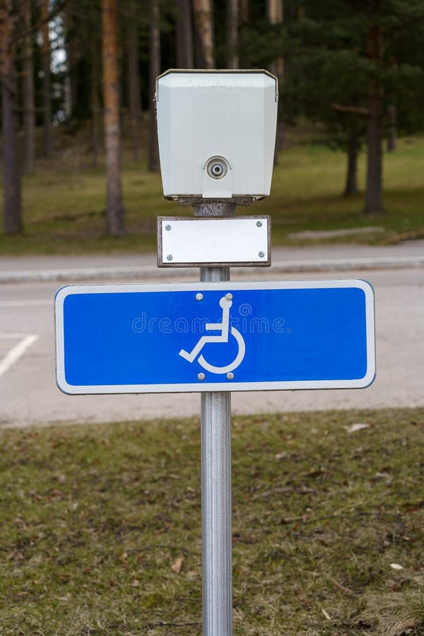 Disabled Parking Sign Below the Outdoor Power Socket Stock Photo ...