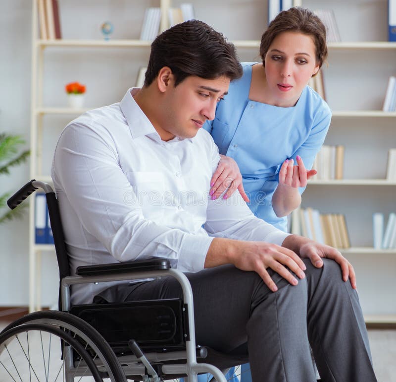 Disabled Patient on Wheelchair Visiting Doctor for Regular Check Stock ...