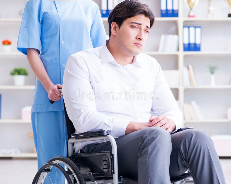Disabled Patient on Wheelchair Visiting Doctor for Regular Check Stock ...