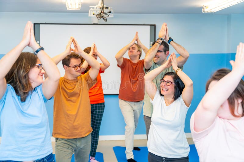 Disabled People Having Fun during Yoga Class Together Stock Photo ... Disabled People Having Fun during Yoga Class Together Stock Photo ...