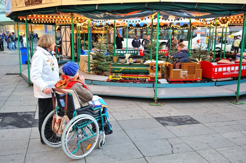 Disabled Person in Christmas Market Editorial Photography - Image of ...
