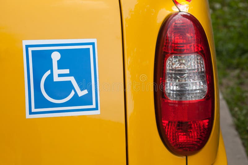 Disabled Sign on Back of Car Stock Photo - Image of handicapped, chair ...