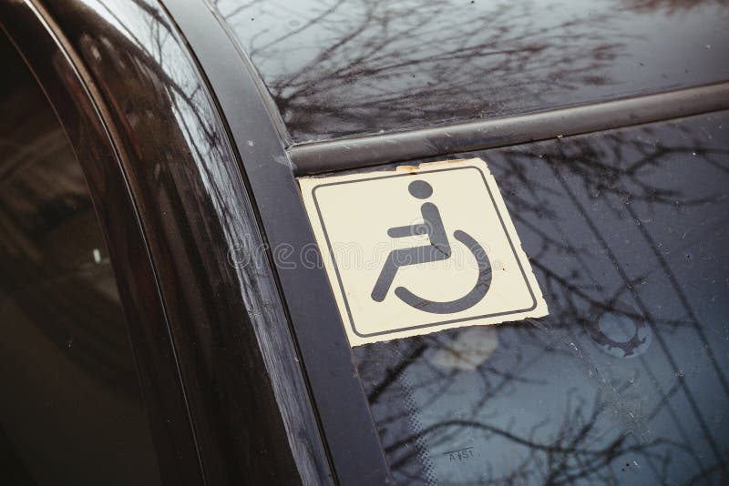 Disabled Sign on the Car Glass. Stock Photo - Image of disability ...