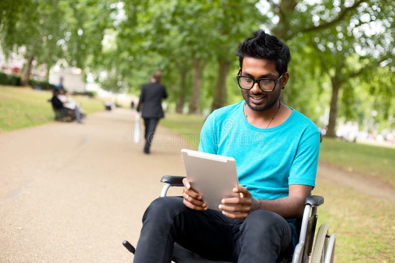 Disabled man at atm stock photo. Image of indian, disability - 61783182