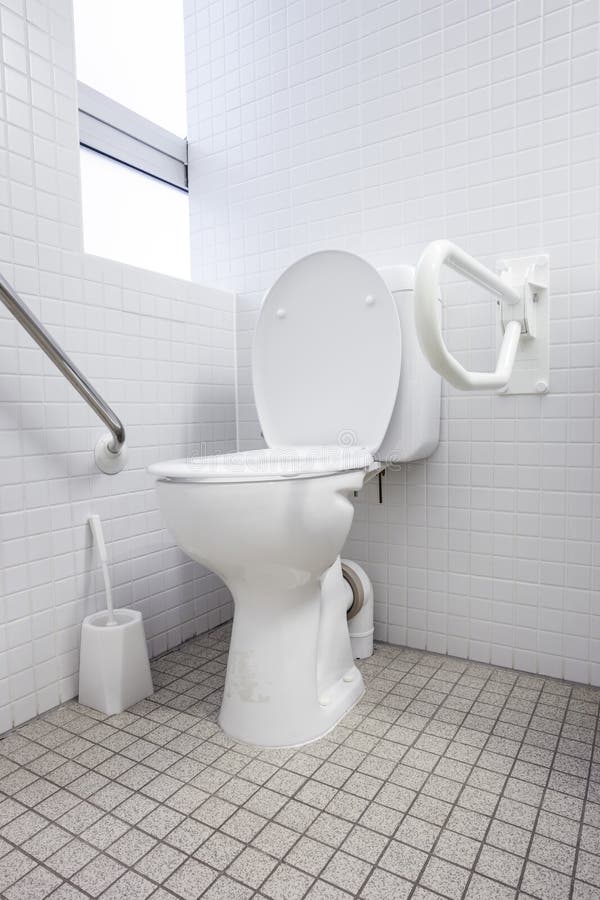 An disabled toilet stock image. Image of siphon, tiles - 67289827
