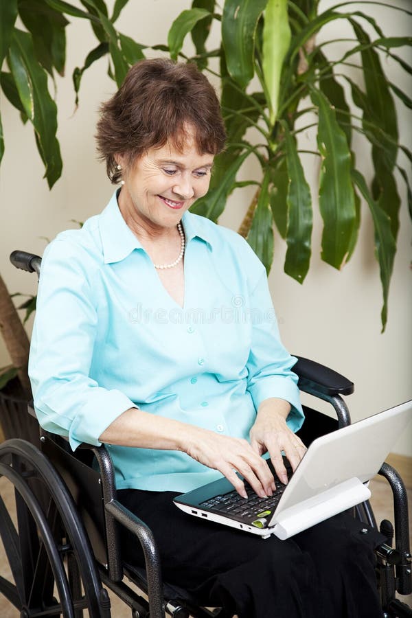 Disabled Woman with Laptop stock photo. Image of person - 18367800