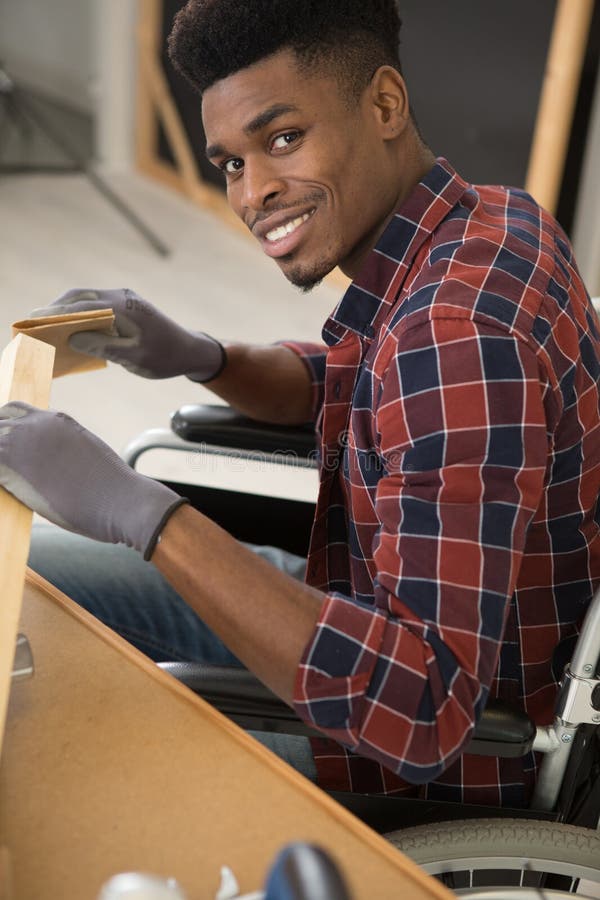 Disabled Worker in Wheelchair in Carpenters Workshop Stock Photo ...