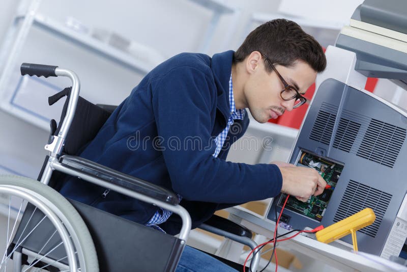 Disabled Worker in Wheelchair Checkin Voltage Stock Photo - Image of ...