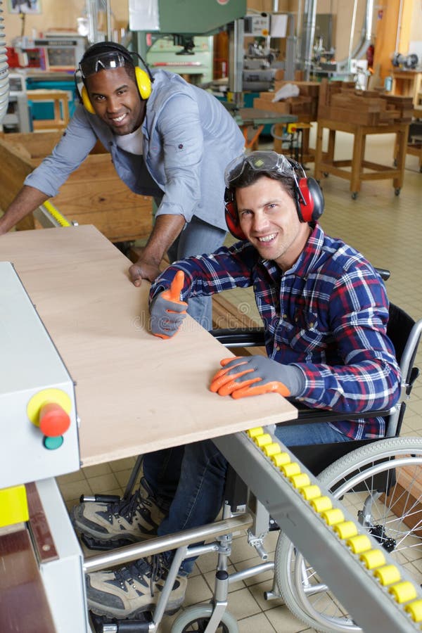 Disabled Worker in Wheelchair with Colleague Showing Thumb Up Stock ...
