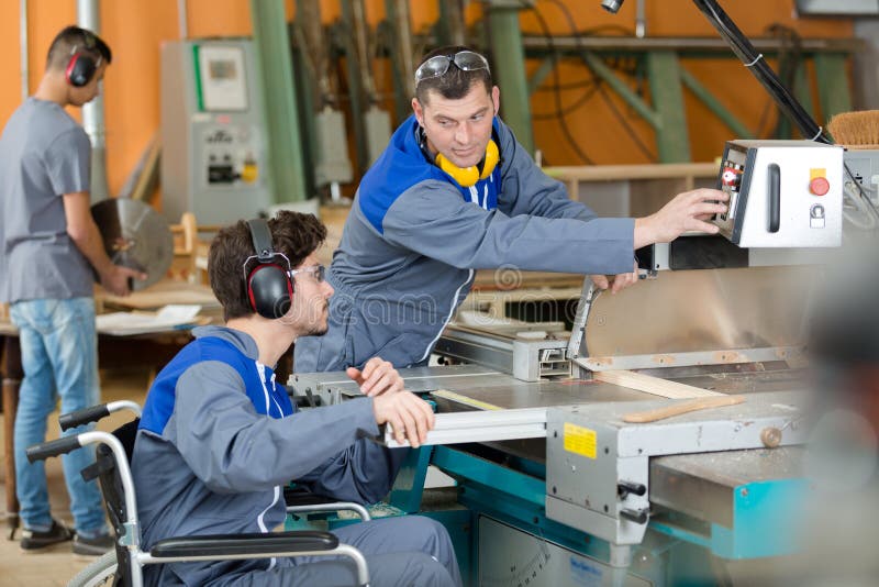 Disabled Worker in Wheelchair in Factory Stock Image - Image of ...