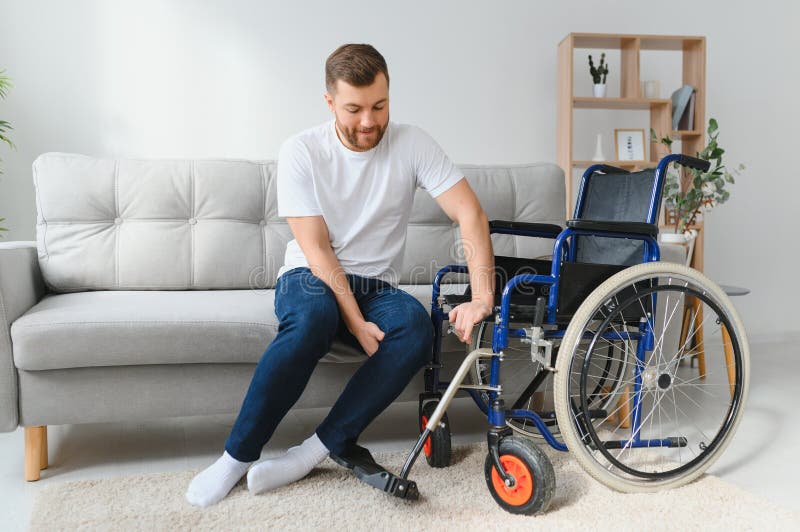 Disabled Young Black Guy Trying Sit Down. Stock Photo - Image of ...