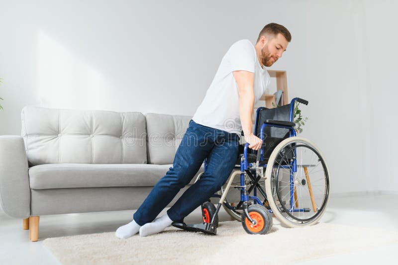 Disabled Young Black Guy Trying Sit Down. Stock Image - Image of ...