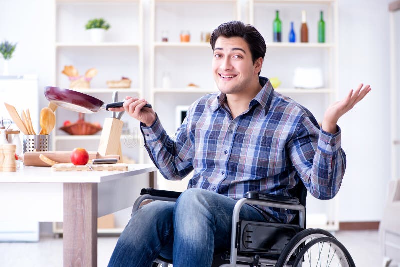 The Disabled Young Husband Frying At Kitchen Stock Photo - Image of ...