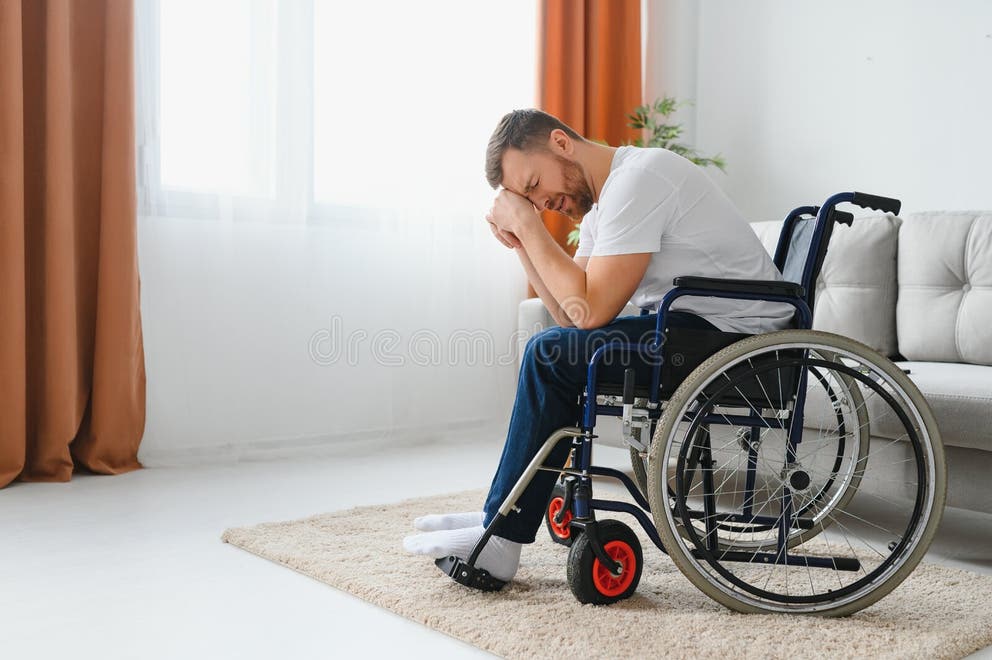Disabled Young Man Suffering at Home. Stock Photo - Image of home ...