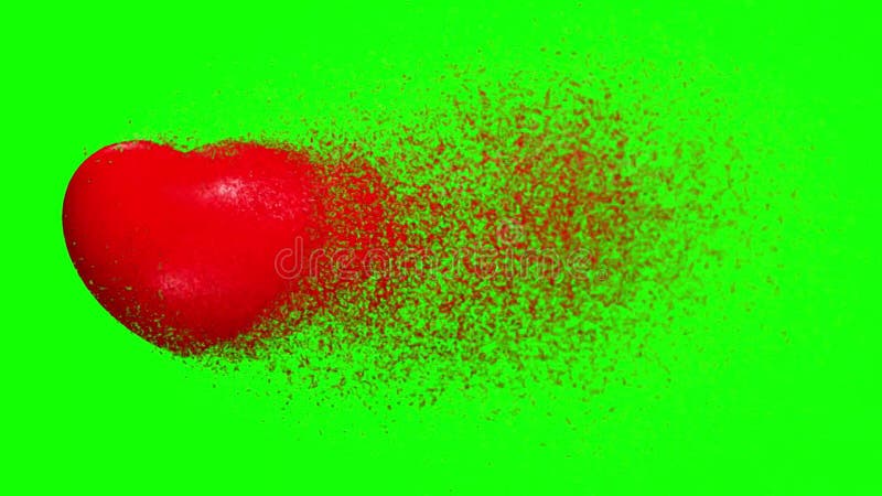 Disappearing Red Heart into Tiny Particles on Green Screen Background ...