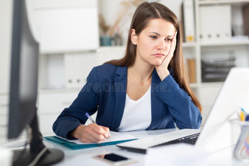 Disappointed Female Office Employee Working with Laptop Stock Image ...