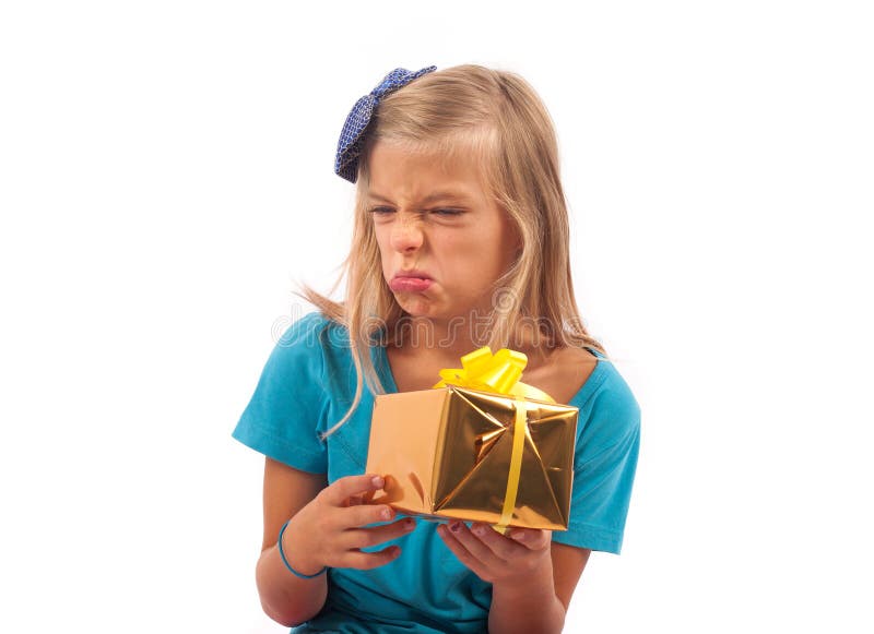 Disappointed kid with gift stock image. Image of disappointed - 60271333