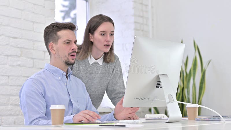 Disappointed Startup Team Reacting To Failure on Desktop Stock Photo ...