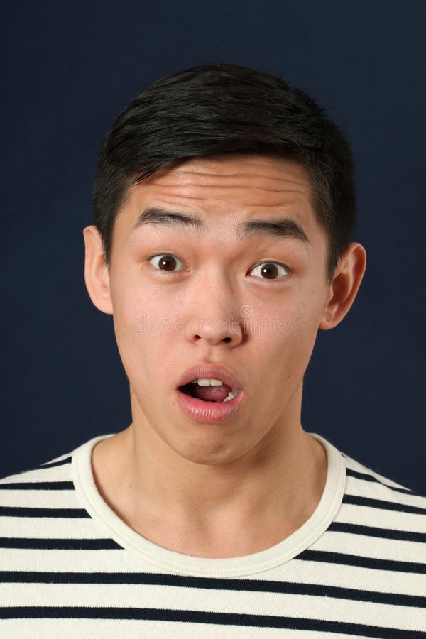 Disappointed Young Asian Man Looking at Camera Stock Photo - Image of ...