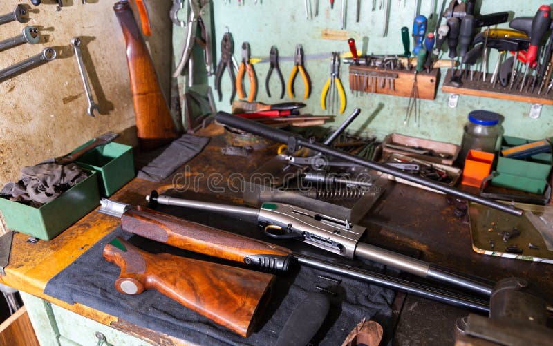 Disassembled Automatic Rifle on the Table of Weapons Workshop Stock ...