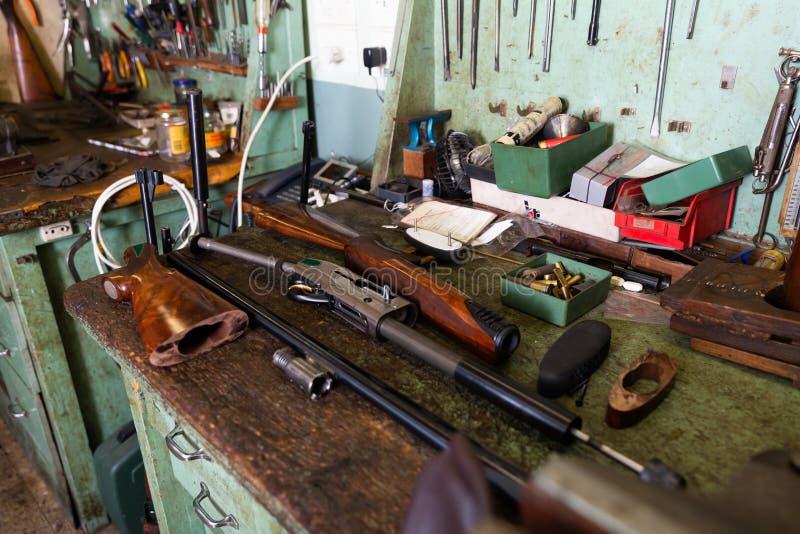 Disassembled Automatic Rifle on the Table of Weapons Workshop Stock ...