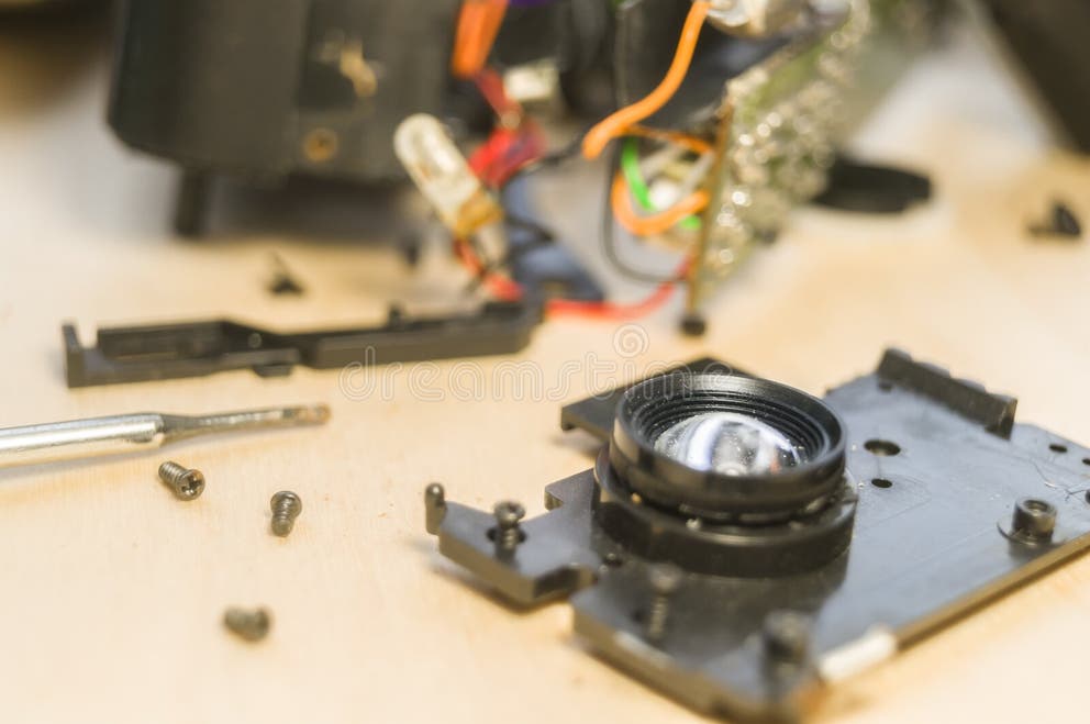 Disassembled Compact Camera. Internal Parts of the Broken Camera Being ...
