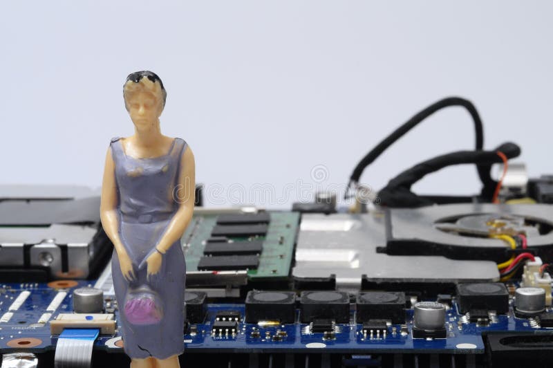 Disassembled Computer Components and People Figurines Stock Image ...