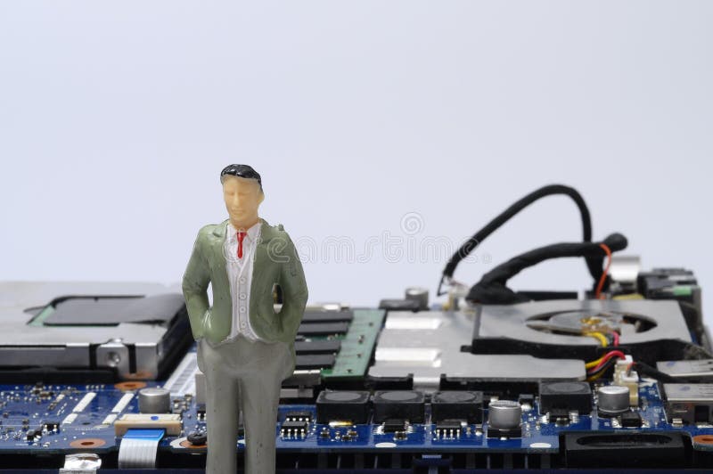 Disassembled Computer Components and People Figurines Stock Image ...