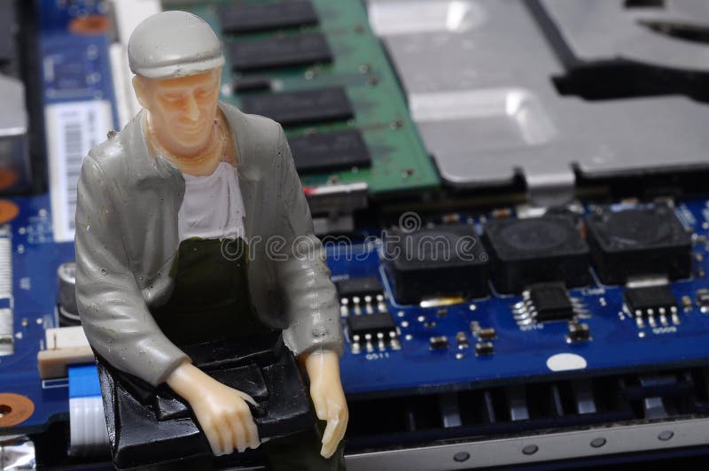 Disassembled Computer Components and People Figurines Stock Photo ...