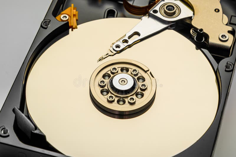 Disassembled Computer Hard Disk Gold Color Closeup Stock Photo - Image ...