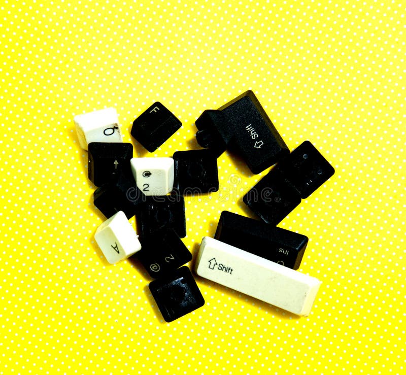 Disassembled Computer Keyboard Keys ,old and Dirty on Yellow Stock ...