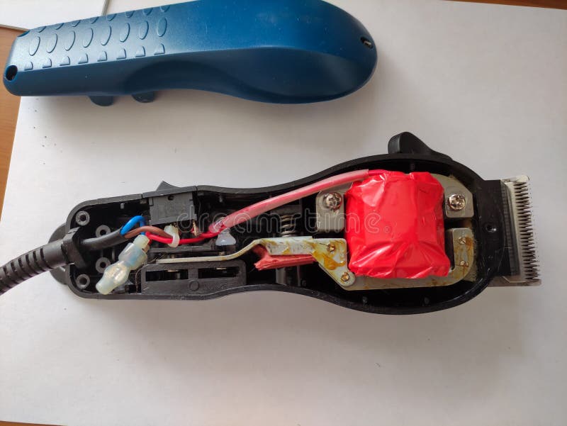 Disassembled Electric Hair Clipper on the Table Stock Photo - Image of ...