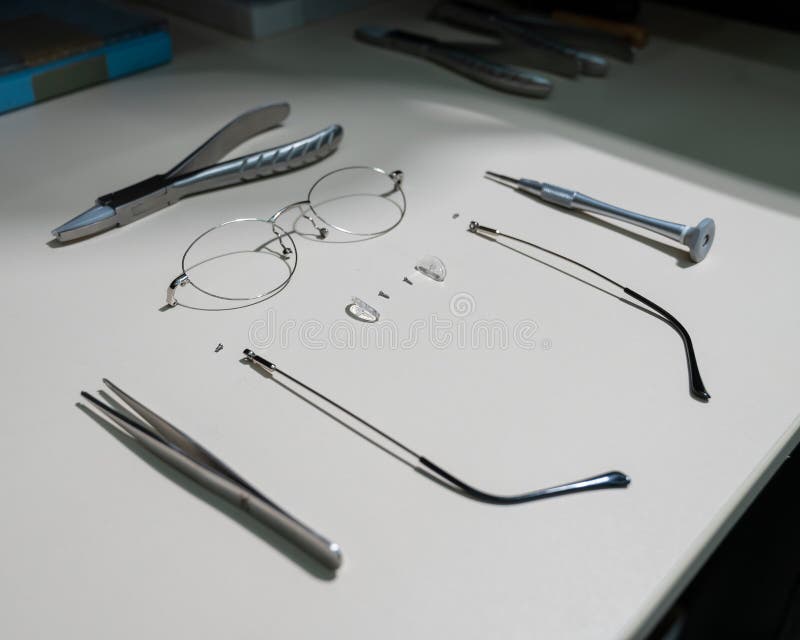 Disassembled Glasses Frame and Tools. Optics Work Table. Stock Image ...