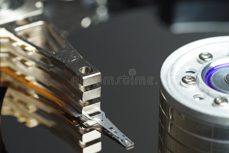 Disassembled Hard Disk Drive Inside Close-up, Spindle, Actuator Arm ...