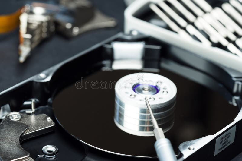 Disassembled Hard Disk Drive Inside Close-up, Spindle, Actuator Arm ...