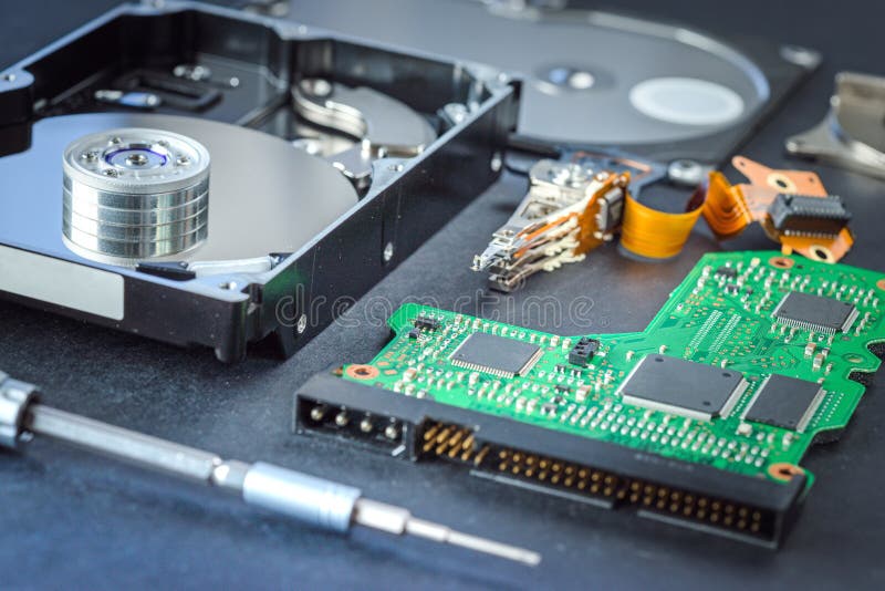 Disassembled Hard Disk Drive Inside Close-up, Spindle, Actuator Arm ...