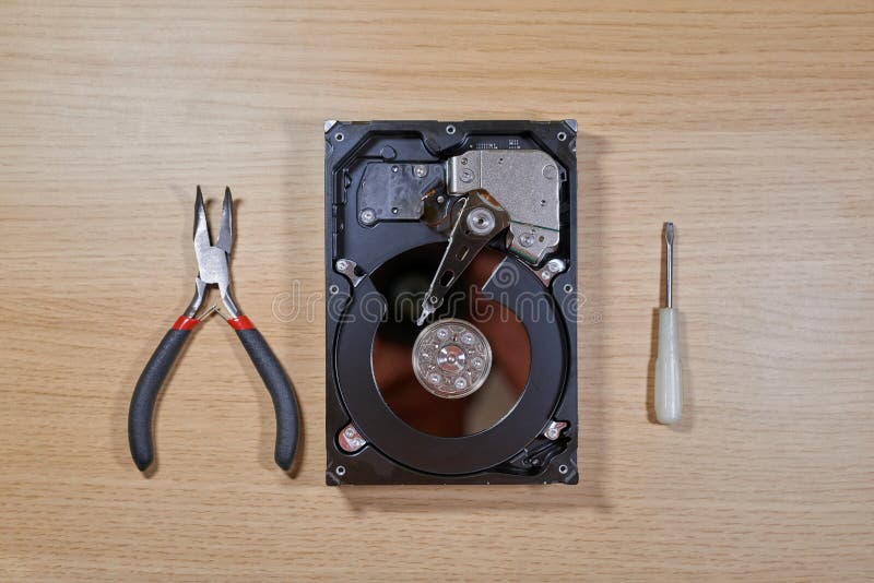 Disassembled Hard Disk Drive with Repair Tools Stock Photo - Image of ... Disassembled Hard Disk Drive with Repair Tools Stock Photo - Image of ...