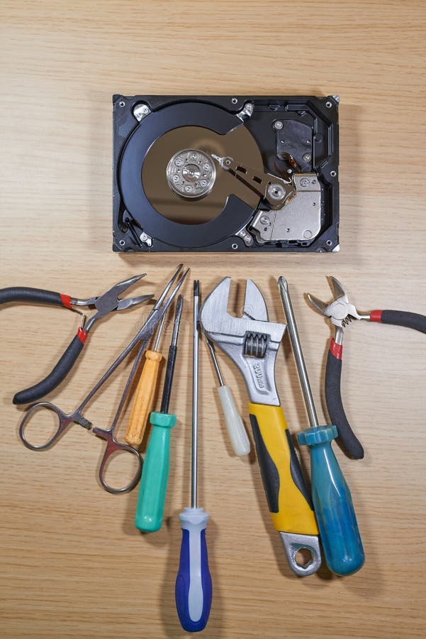 Disassembled Hard Disk Drive with Repair Tools Stock Photo - Image of ... Disassembled Hard Disk Drive with Repair Tools Stock Photo - Image of ...