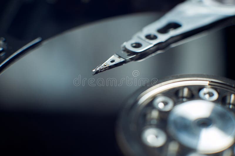 Disassembled Hard Disk. Read Head, Magnetic Disk and Spindle Close-up ...