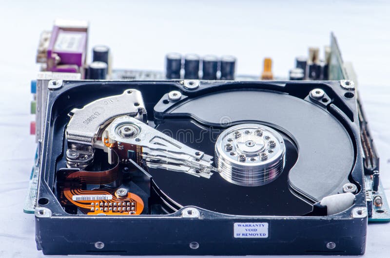 Disassembled Hard Drive from the Computer Stock Image - Image of male ... Disassembled Hard Drive from the Computer Stock Image - Image of male ...